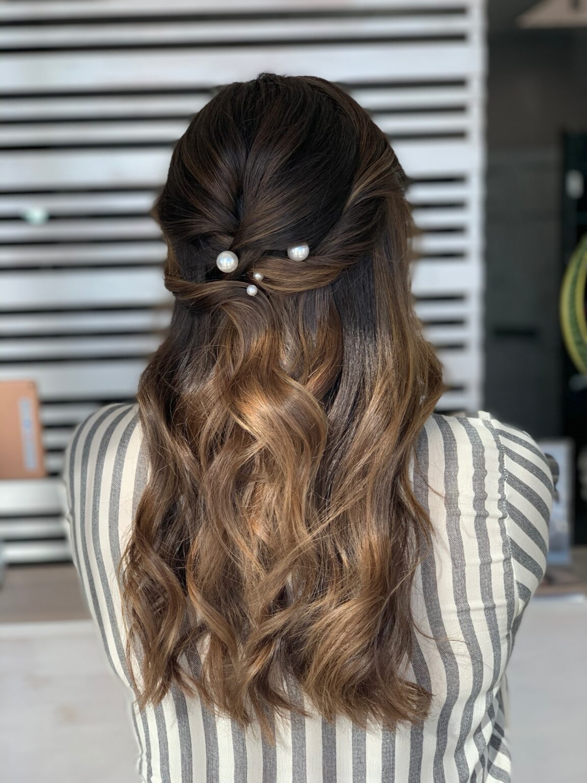 Elegant Half Up Half Down Curled Hairstyle with Pearl Accents for Your ...